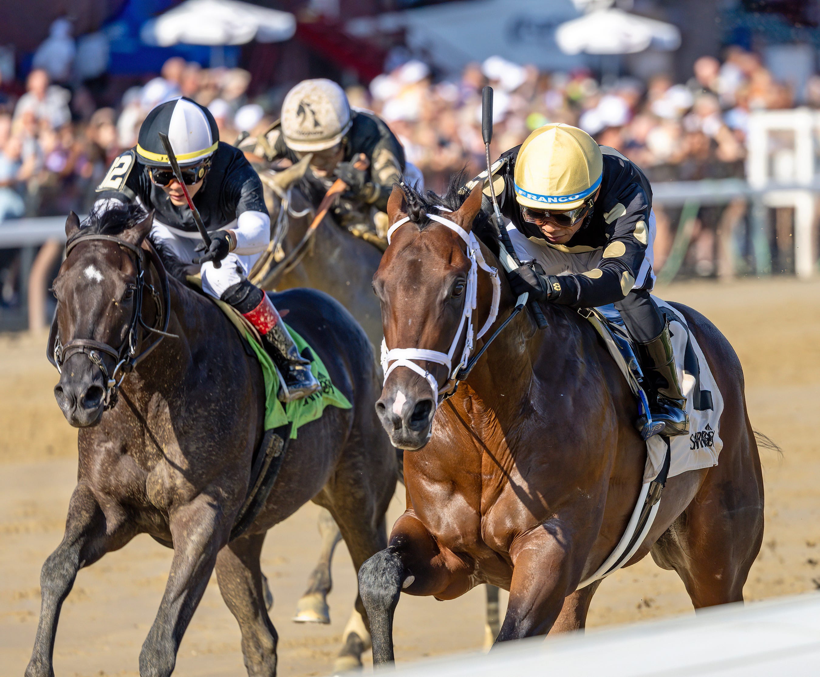 Ship Cadet motors through the mud in off-the-turf Skidmore Stakes