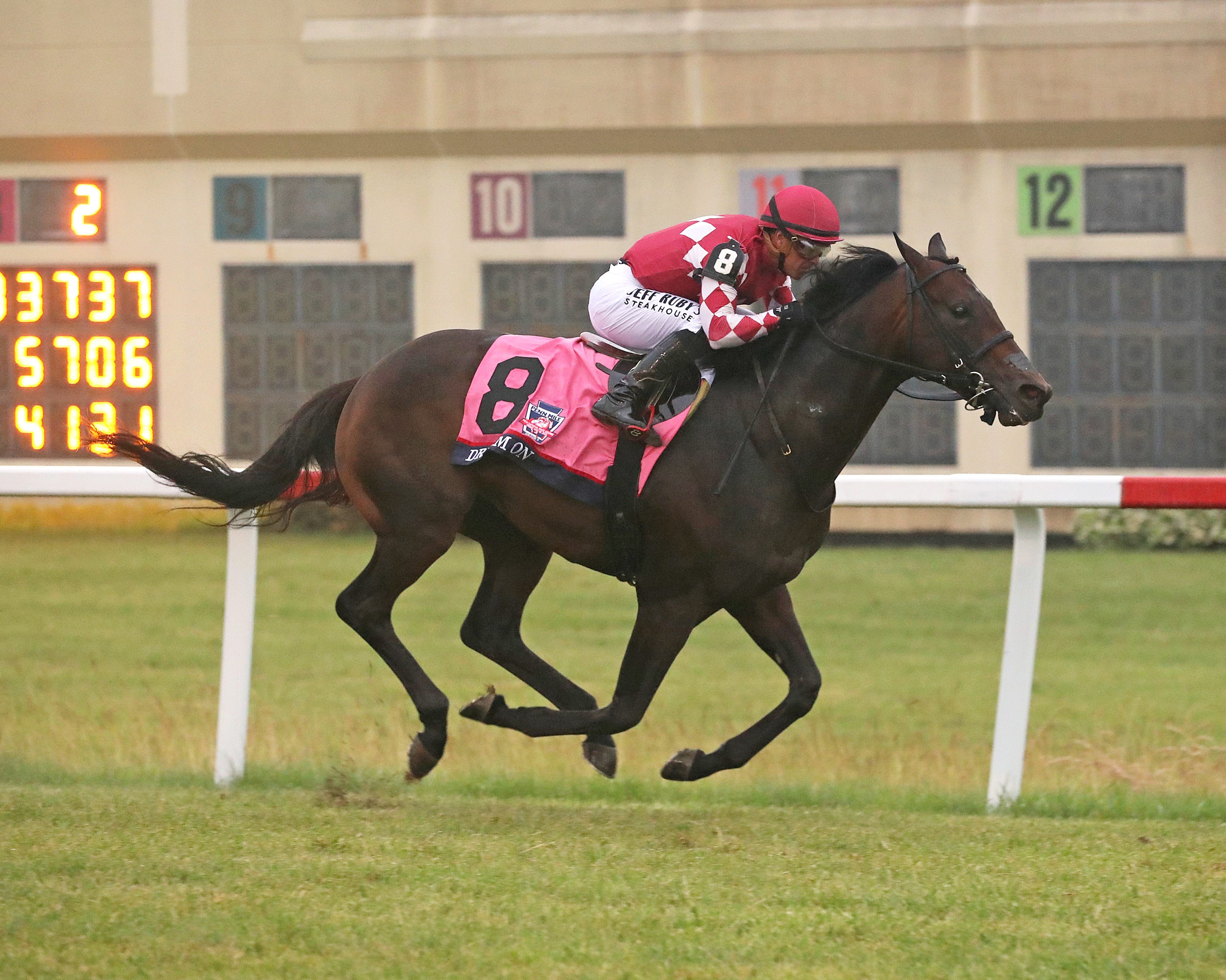 Dream On splits horses, powers home in Penn Mile