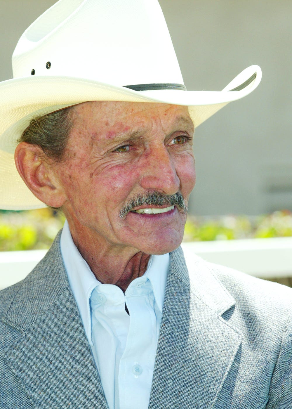 Former jockey Lambert dies at 74